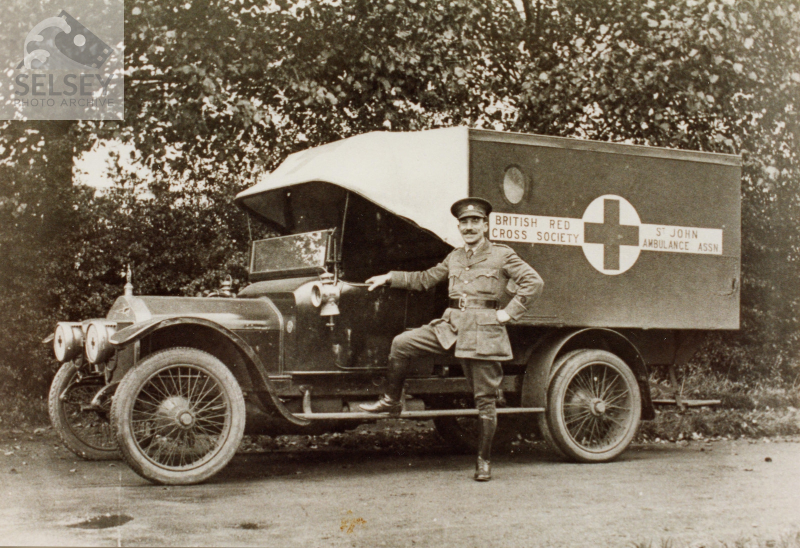 Serviceman poses on Red Cross van - Selsey Photo Archive